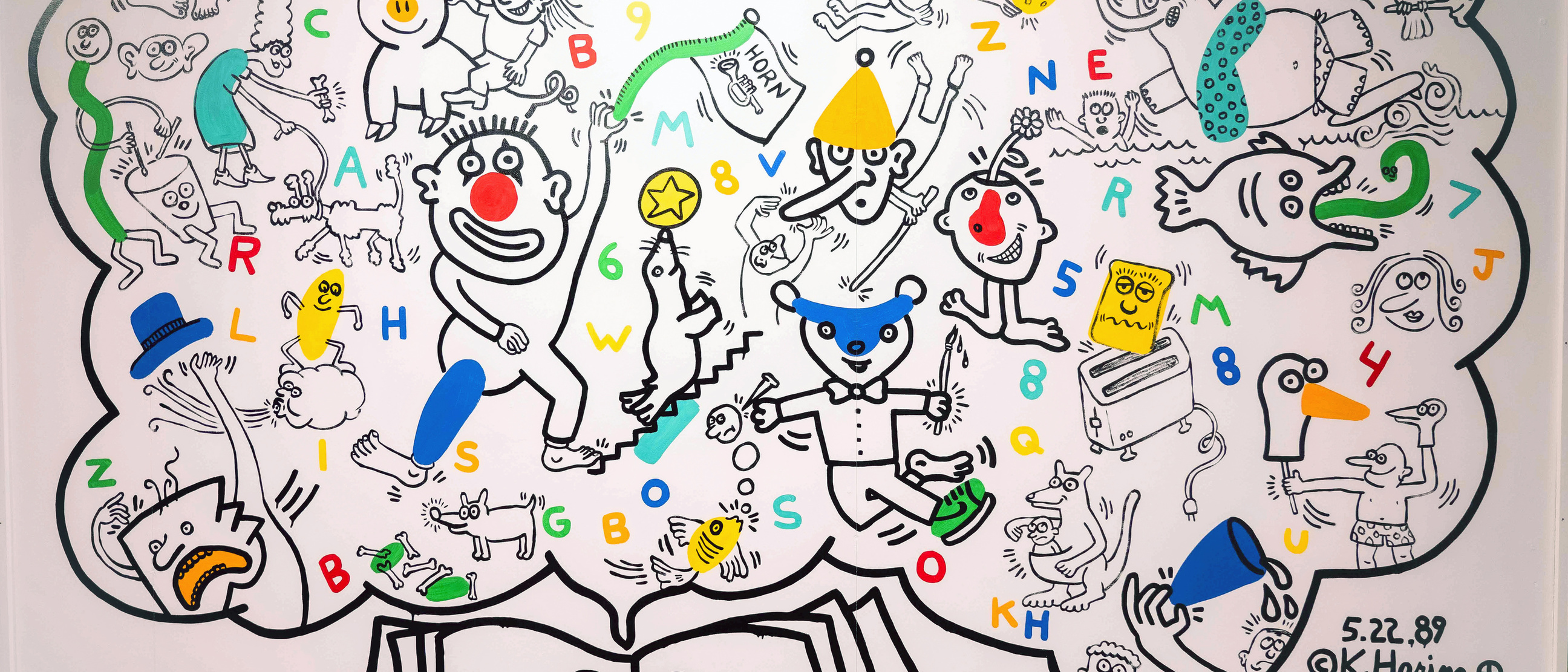 Keith Haring mural, painted in an Iowan elementary school, is shown ...